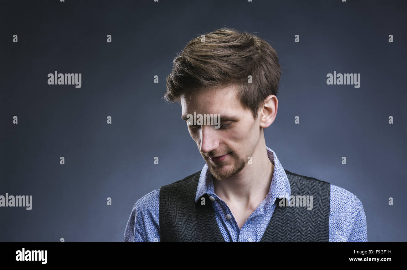 Stylish handsome young man posing. Studio shot on white background ...