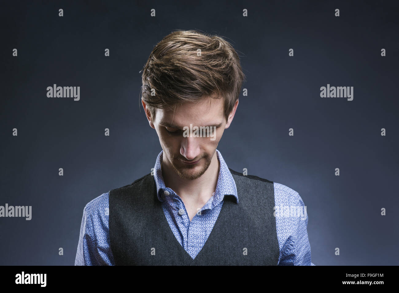 Stylish handsome young man posing. Studio shot on white background ...