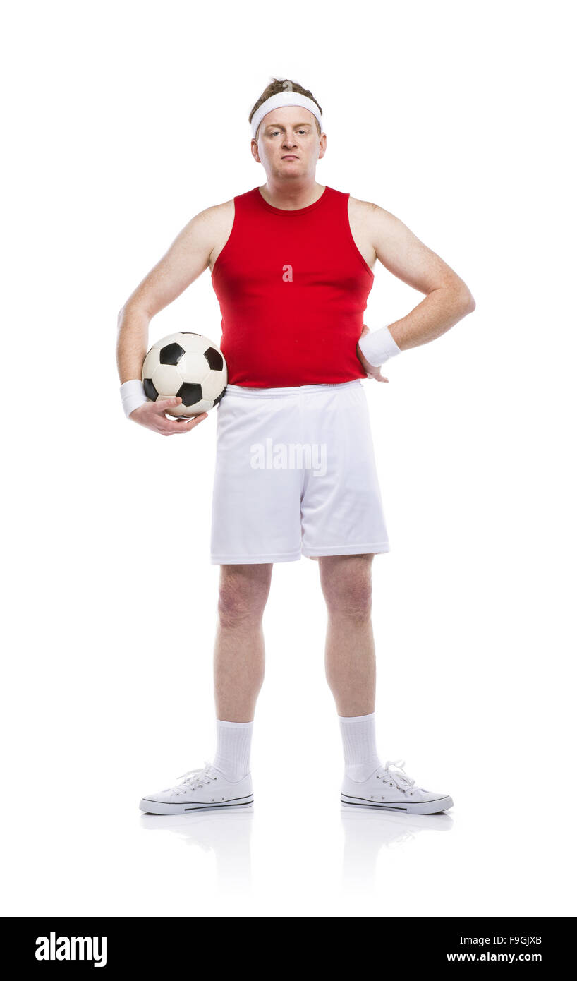 Funny clumsy football player with a ball. Studio shot on white ...