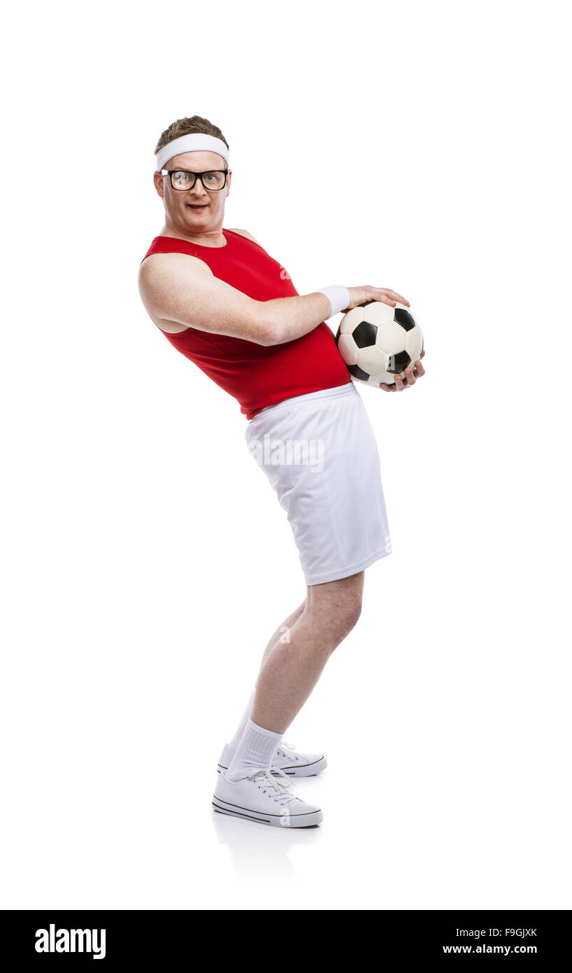 Funny clumsy football player with a ball. Studio shot on white ...