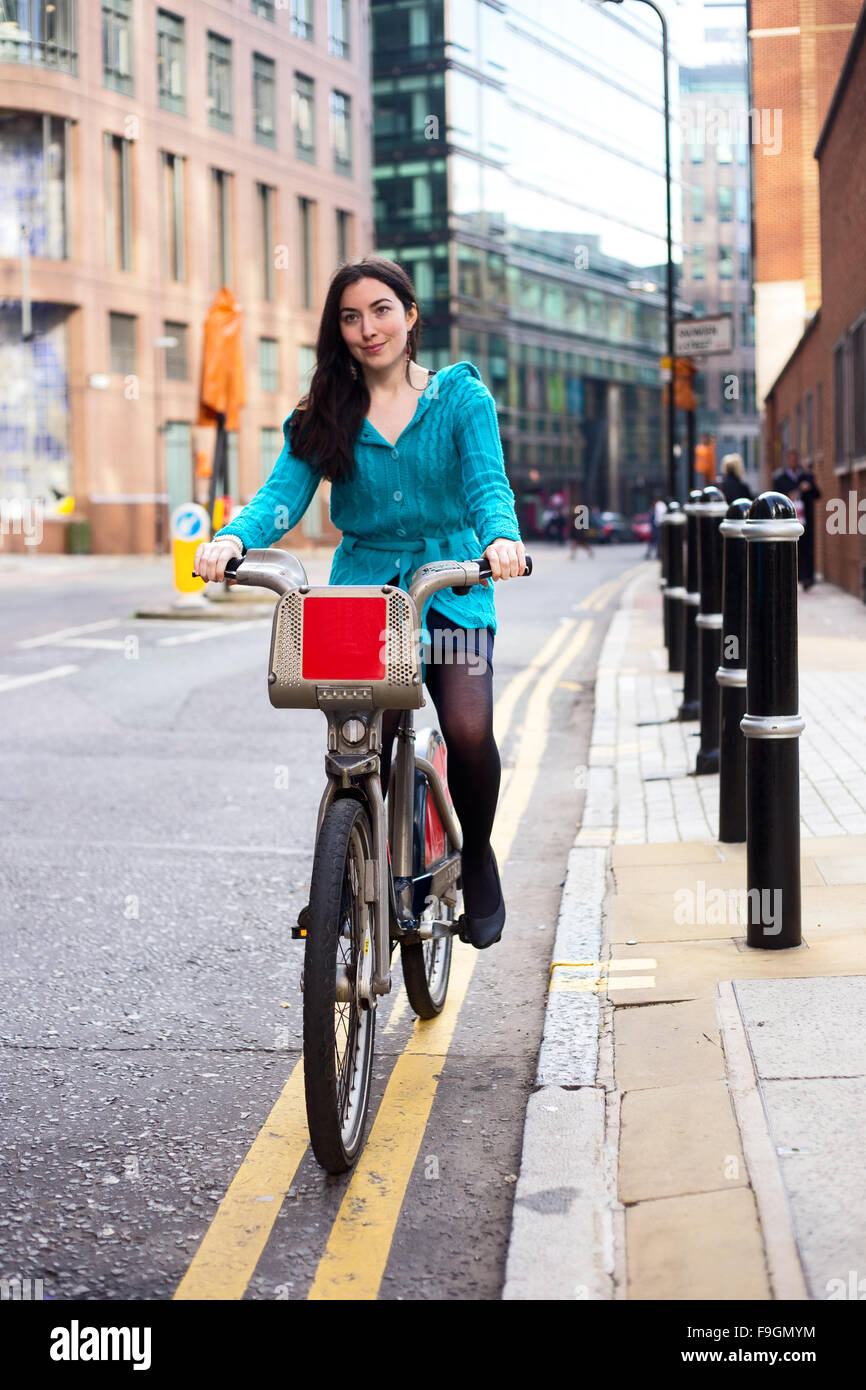 Woman riding cycle hi-res stock photography and images - Alamy