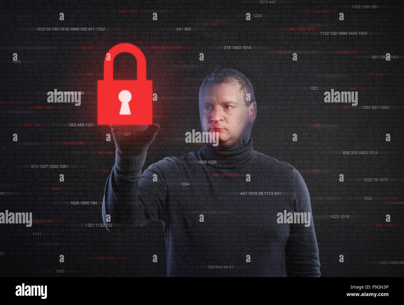 Thief in action stealing information with balaclava on his face ...