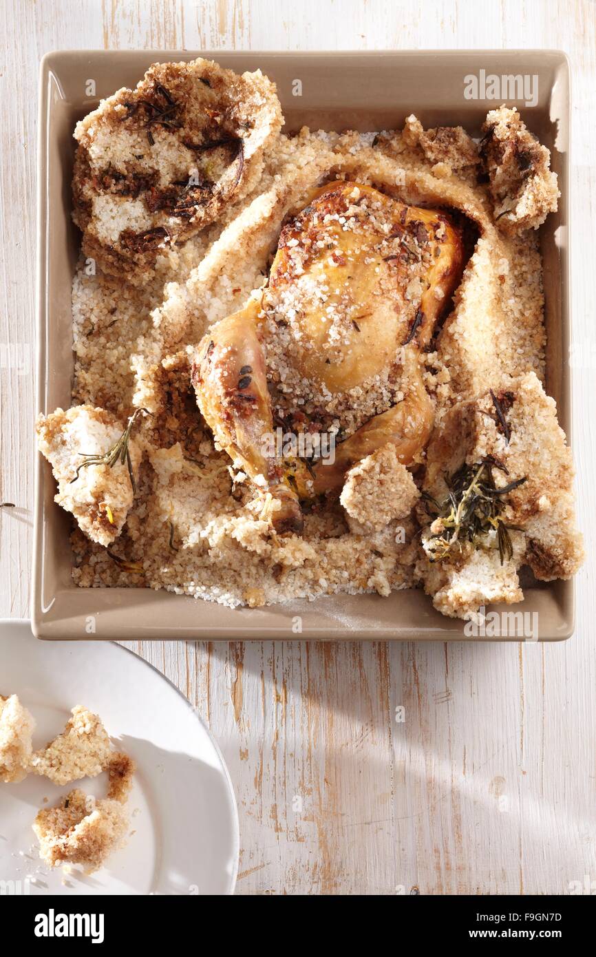 Chicken in salt crust hi-res stock photography and images - Alamy