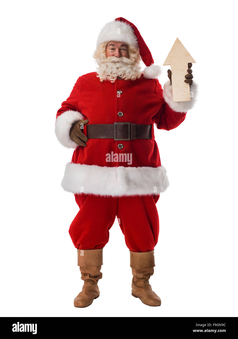 Santa Claus with wooden arrow that shows direction Full-Length Portrait ...