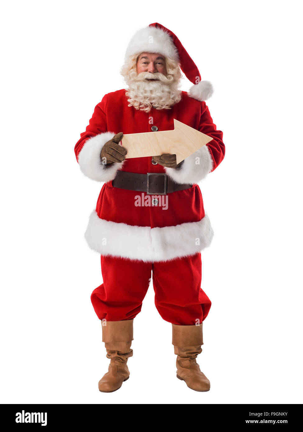 Santa Claus with wooden arrow that shows direction Full-Length Portrait ...