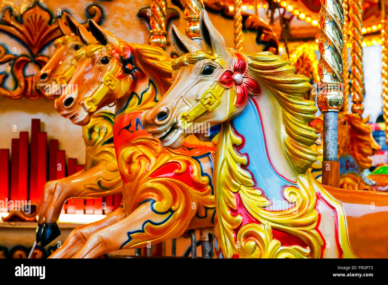 Carousel horses at a fairground Stock Photo - Alamy