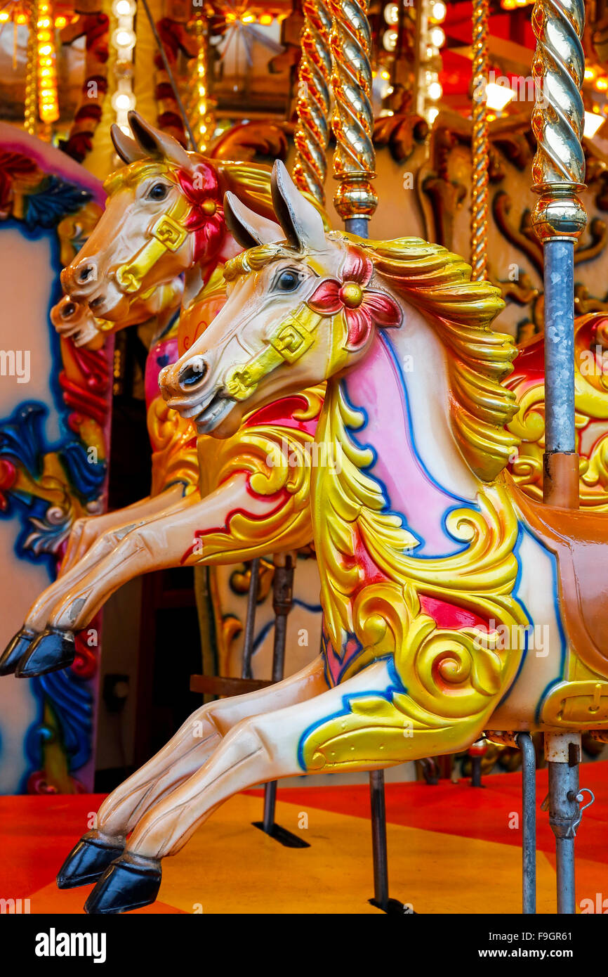 Carousel horses at a fairground Stock Photo - Alamy