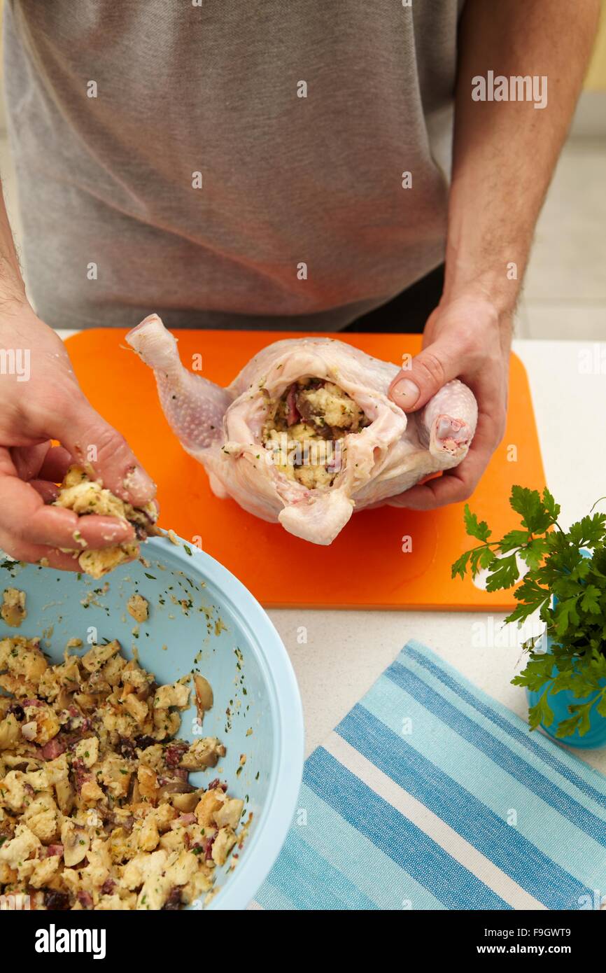 Mushroom stuffed chicken roast + steps Stock Photo - Alamy