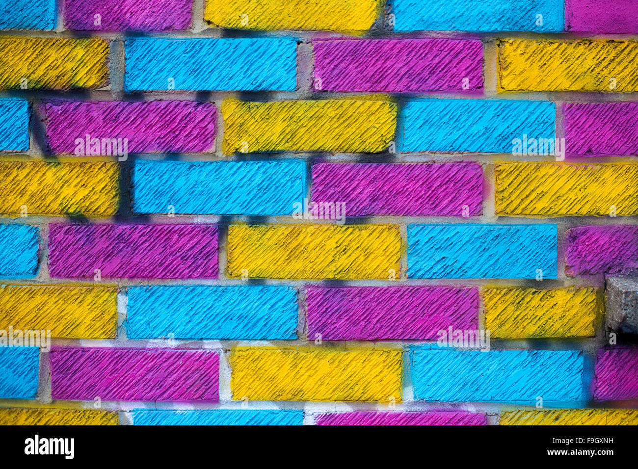 multi coloured brick wall Stock Photo - Alamy