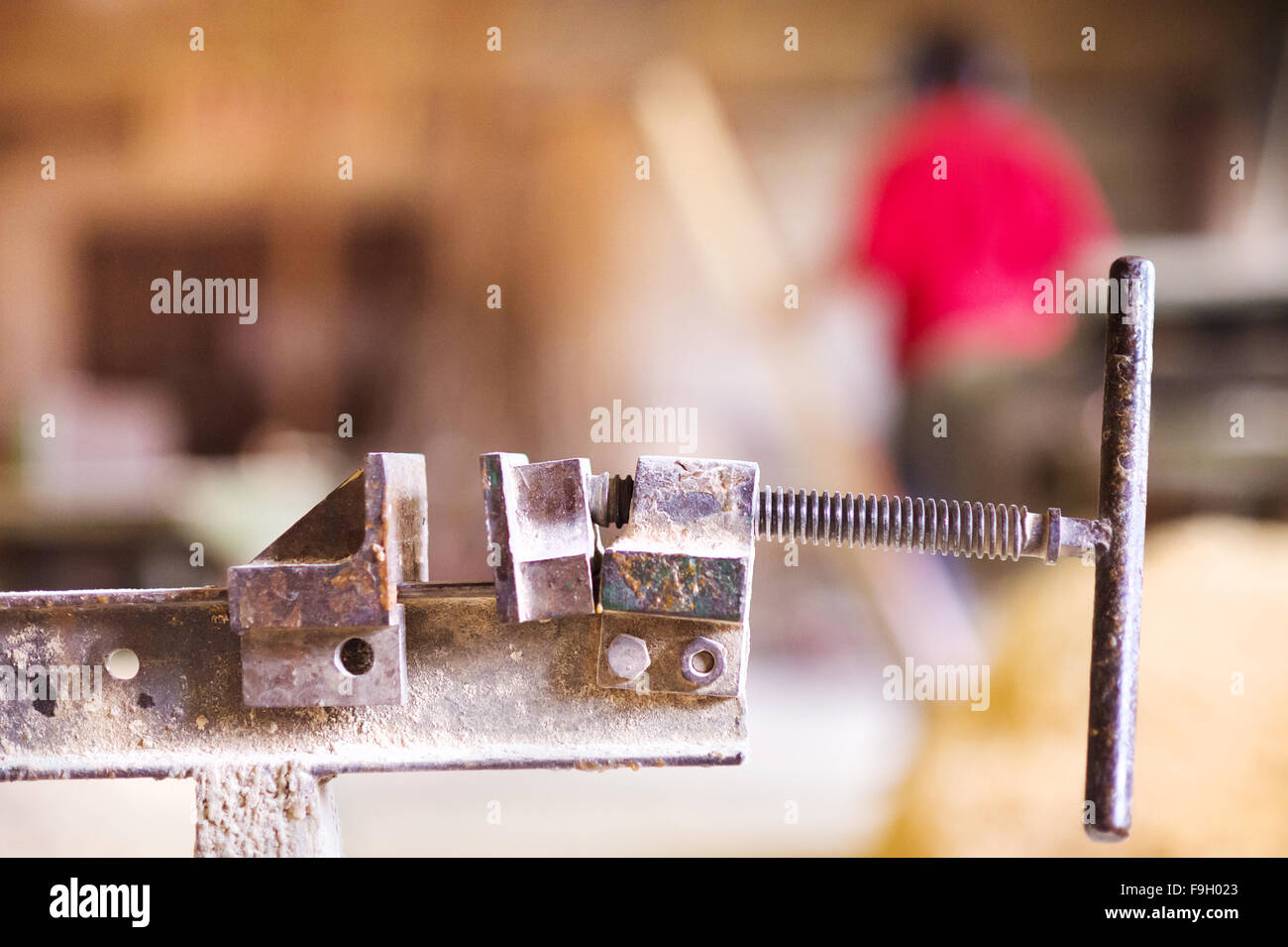 Carpenter screw clamp tools pressing planks together Stock Photo - Alamy