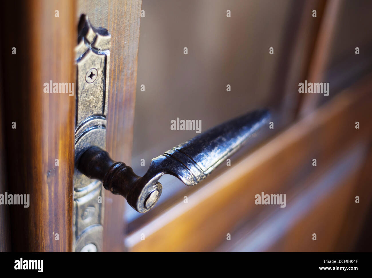Detail of an old engraved door handle Stock Photo - Alamy