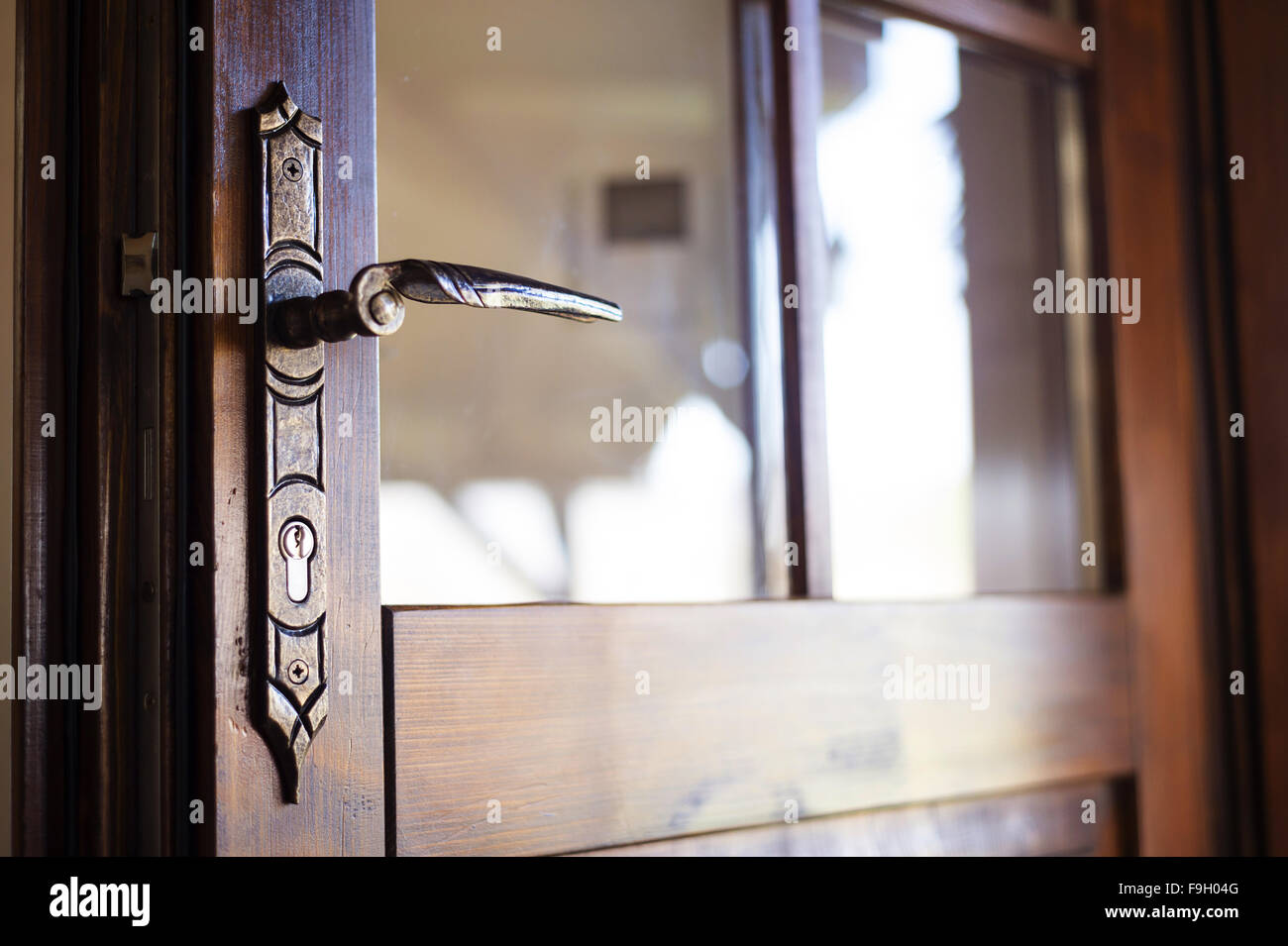 Detail of an old engraved door handle Stock Photo - Alamy