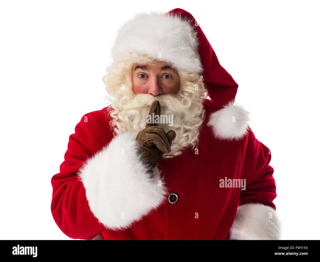 Santa Claus holding, finger on mouth - silence gesture - Closeup ...