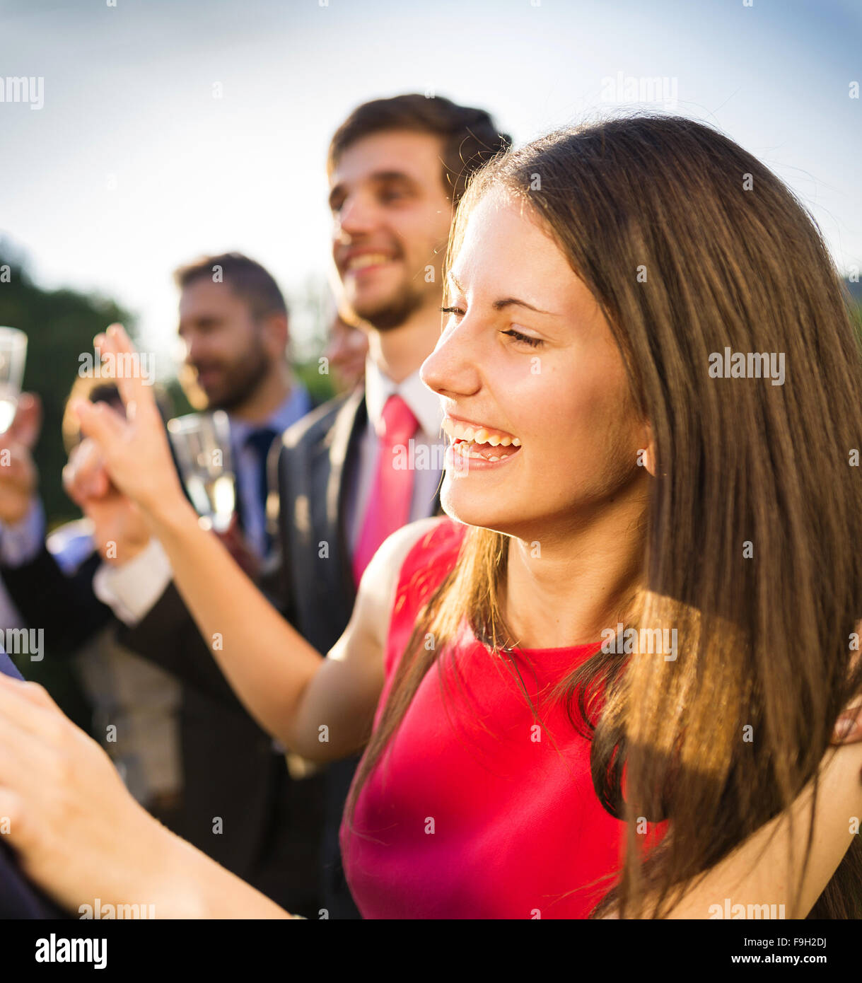 Full length portrait of wedding guests dancing and having fun at the ...