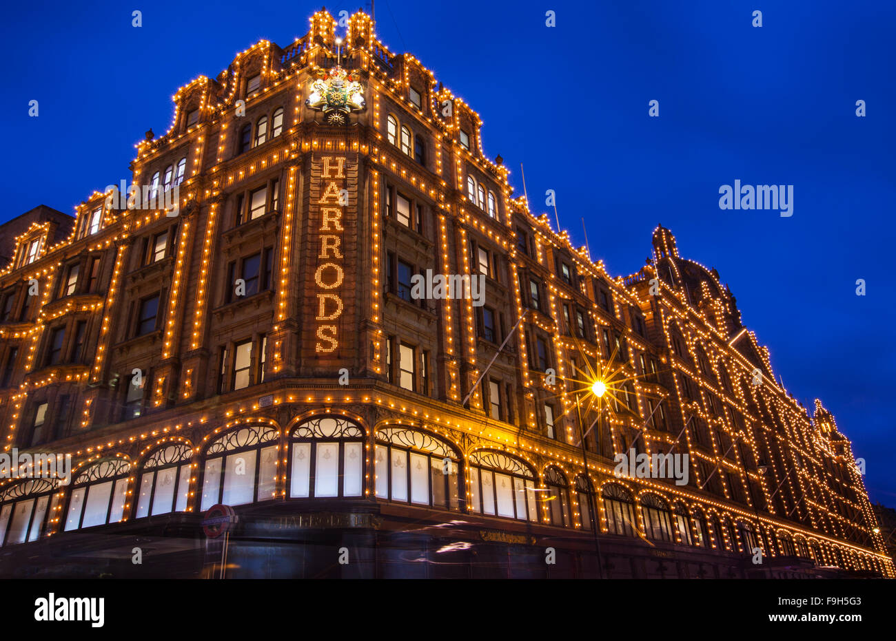 Illuminated facade of the harrods brompton road hi-res stock ...