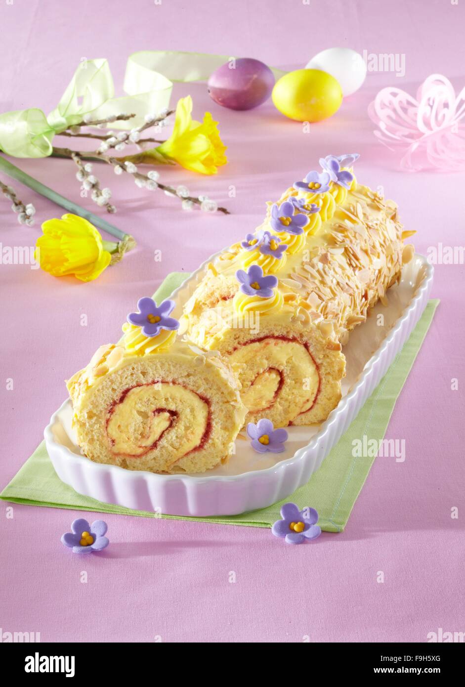 Sweet Roulade with Violets Stock Photo - Alamy