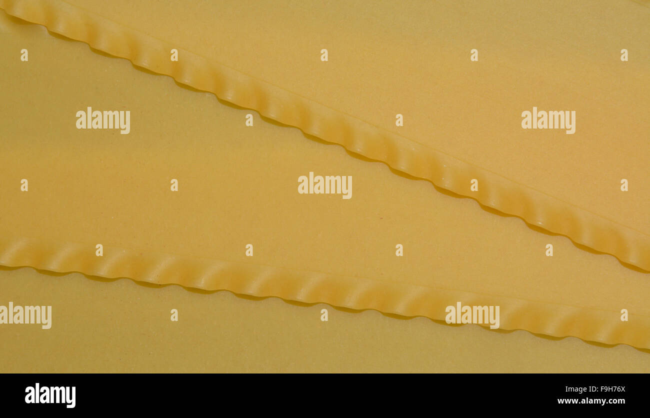 Raw uncooked lasagna pasta noodles Stock Photo - Alamy