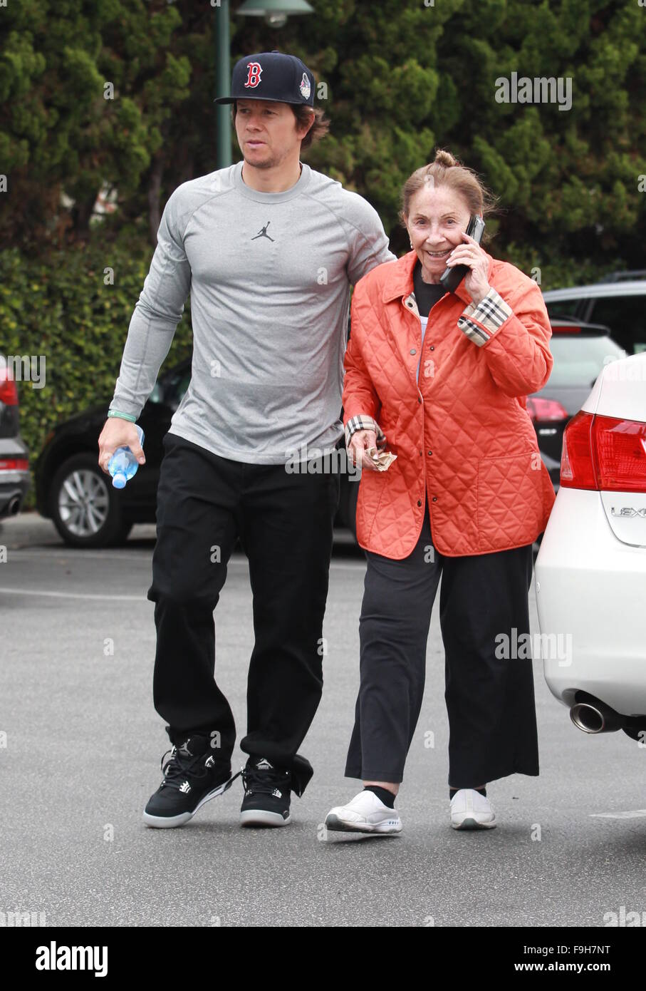 Mark Wahlberg showing his toned torso in a tight t-shirt with Nike ...