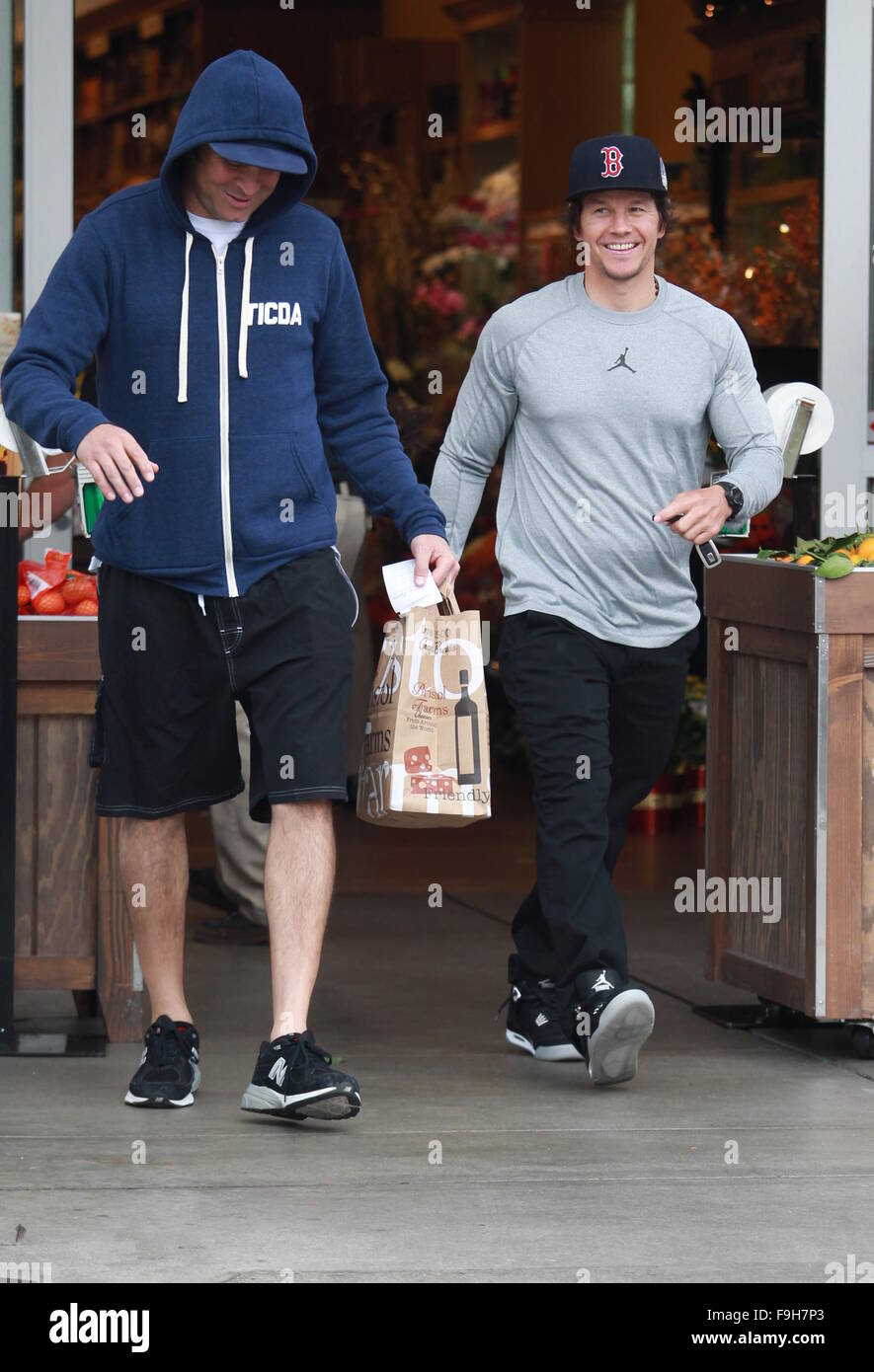 Mark Wahlberg showing his toned torso in a tight t-shirt with Nike ...