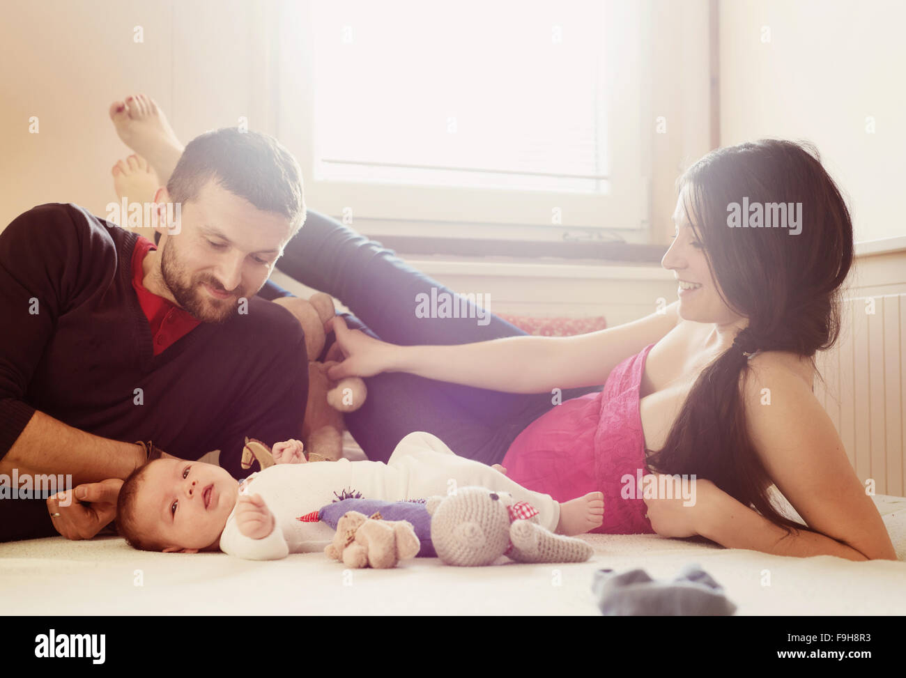 Young Parents With Baby