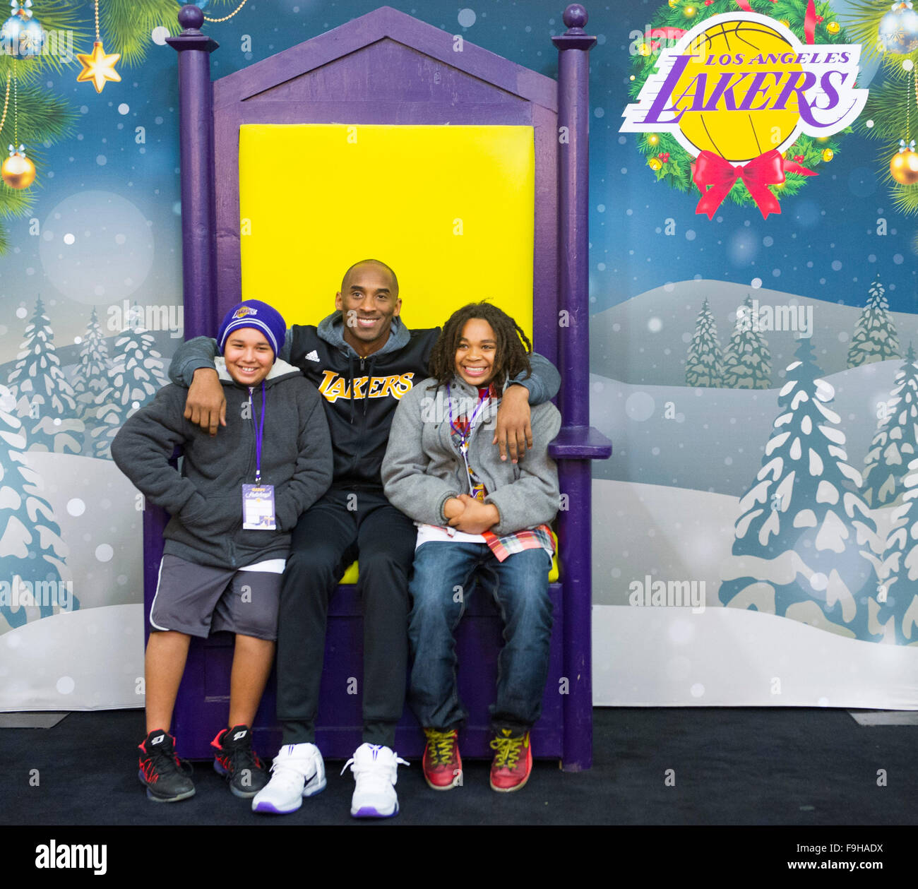 Los Angeles, USA. 16th Dec, 2015. Kobe Byrant of Lakers poses with kids ...