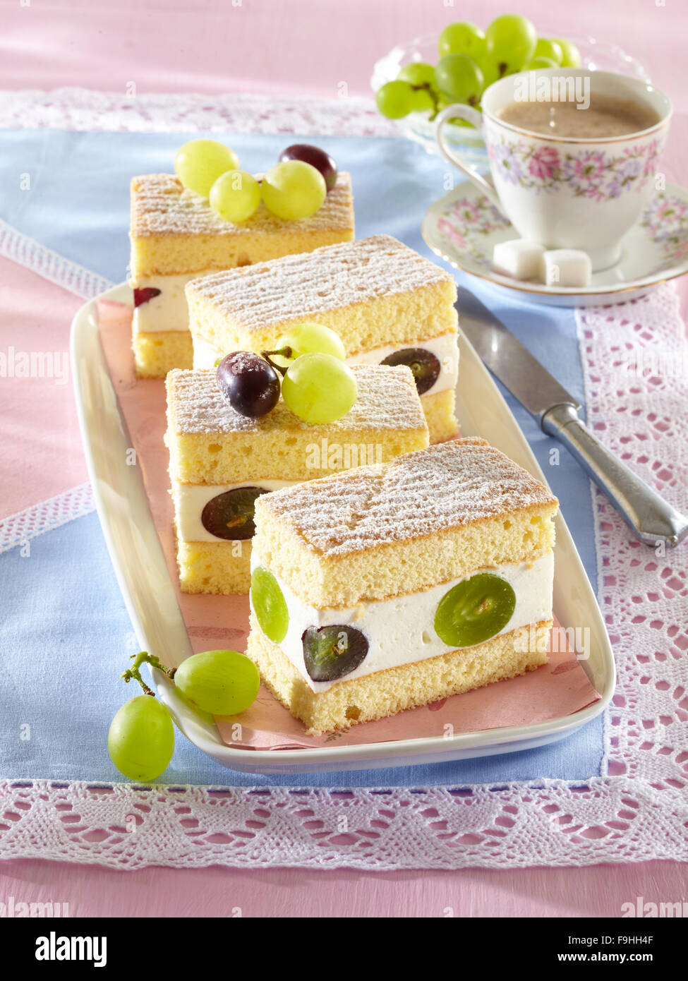 Sponge cake with grapes Stock Photo - Alamy