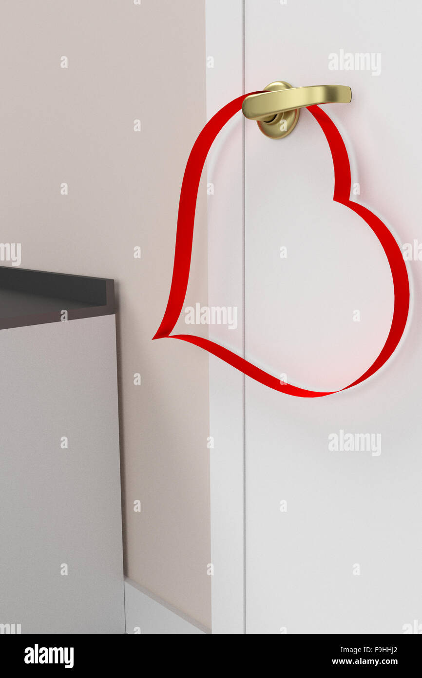 hanging red ribbon heart on the handle Stock Photo - Alamy