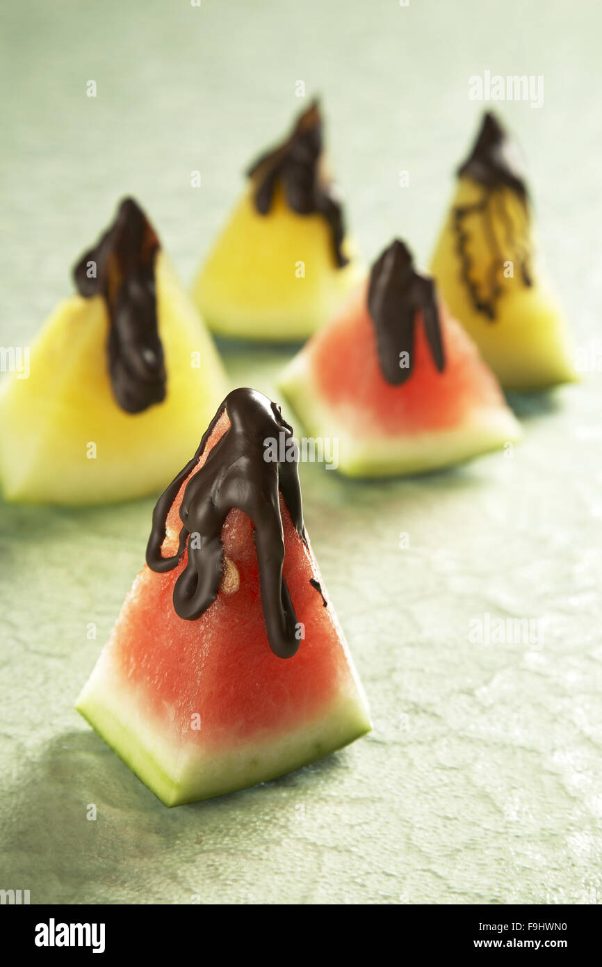 Melon in spicy chocolate Stock Photo - Alamy