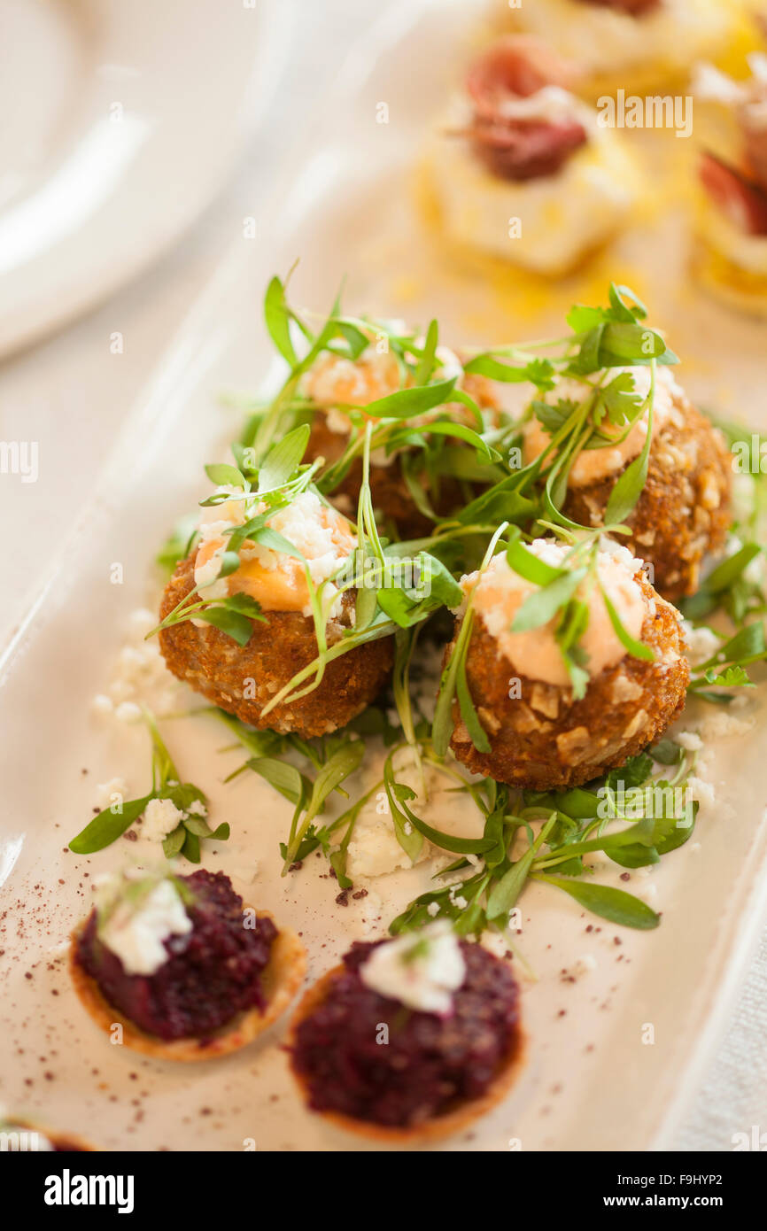 chef's plate appetizer sampler of eggamuffin, beet tarts in Parmesan ...