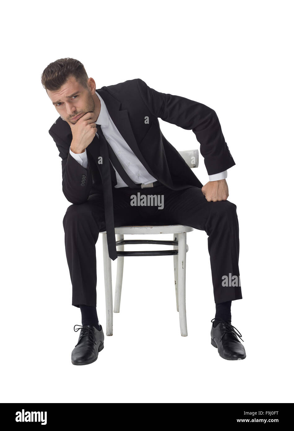 Businessman sitting on chair and thinking Full Length Portrait isolated ...