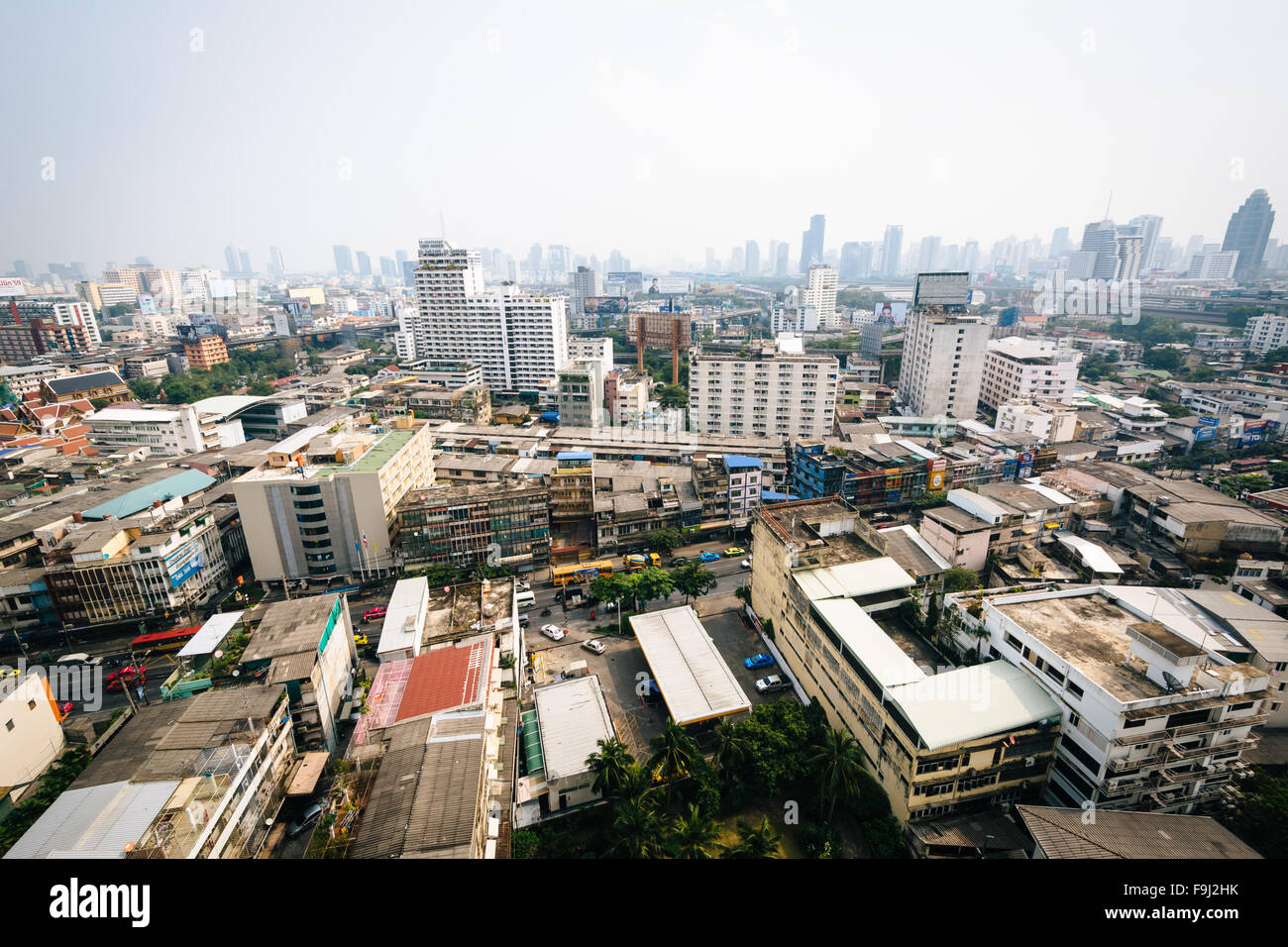 Hazy view of the Ratchathewi District, in Bangkok, Thailand Stock Photo ...