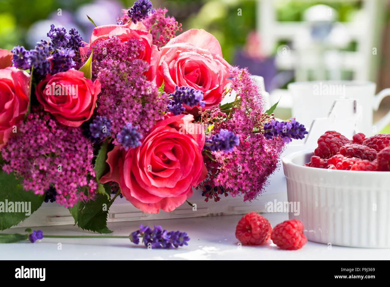summer raspberry decoration table Stock Photo - Alamy