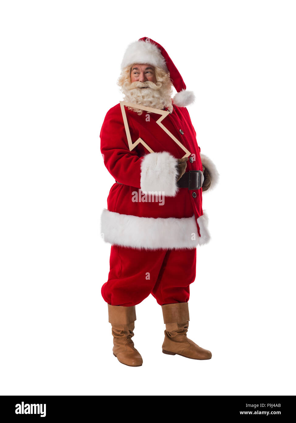 Santa Claus holding wooden arrow and showing direction Full Length ...