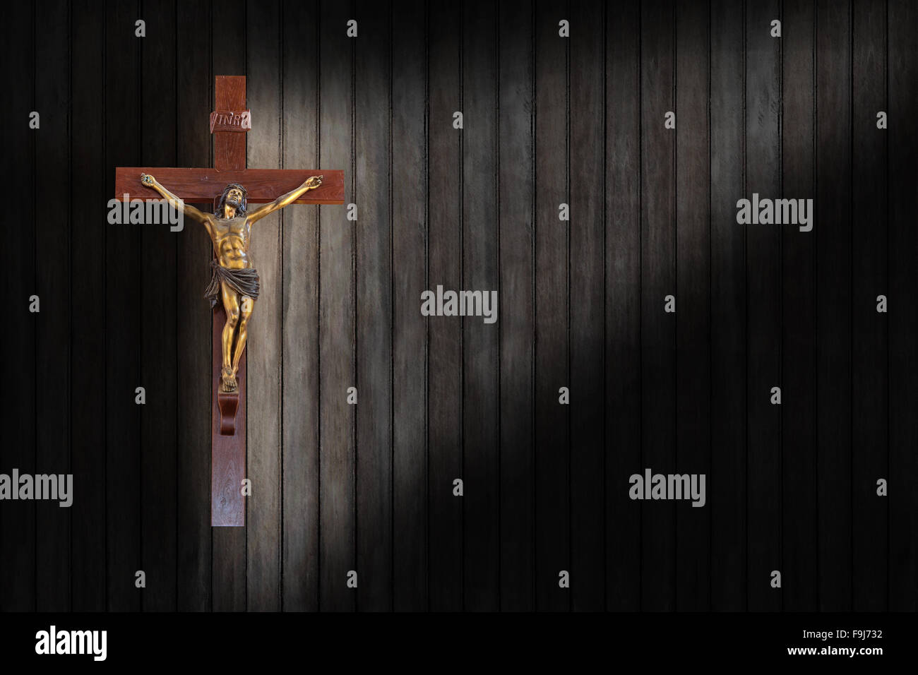 shadow Cross on a wood wall Stock Photo - Alamy