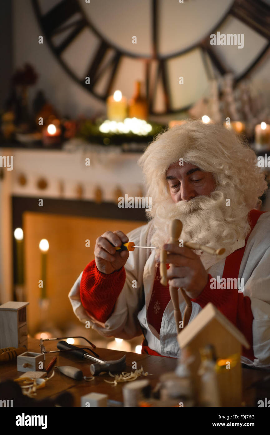 Santa claus home making toys hi-res stock photography and images - Alamy
