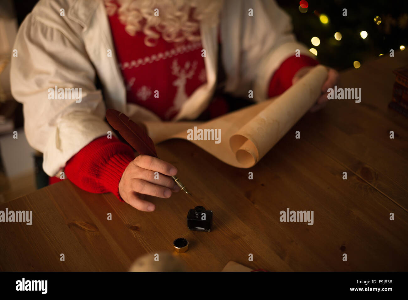 Santa Claus at Home writing and signing letter to child Stock Photo - Alamy