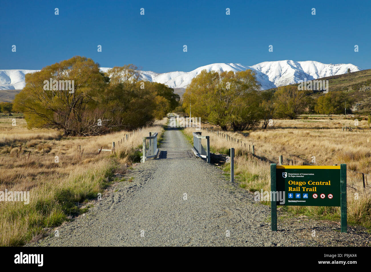 Otago Central Rail Trail in Ida Valley, and snow on Ida Range, Central ...