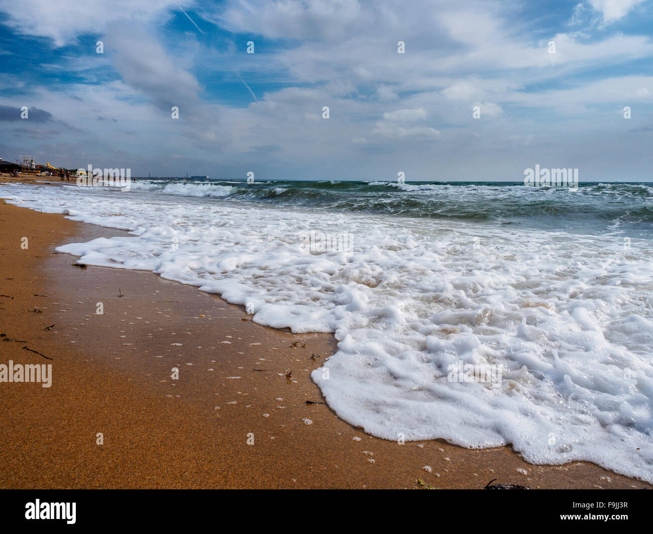 sea foam on the beach Stock Photo - Alamy
