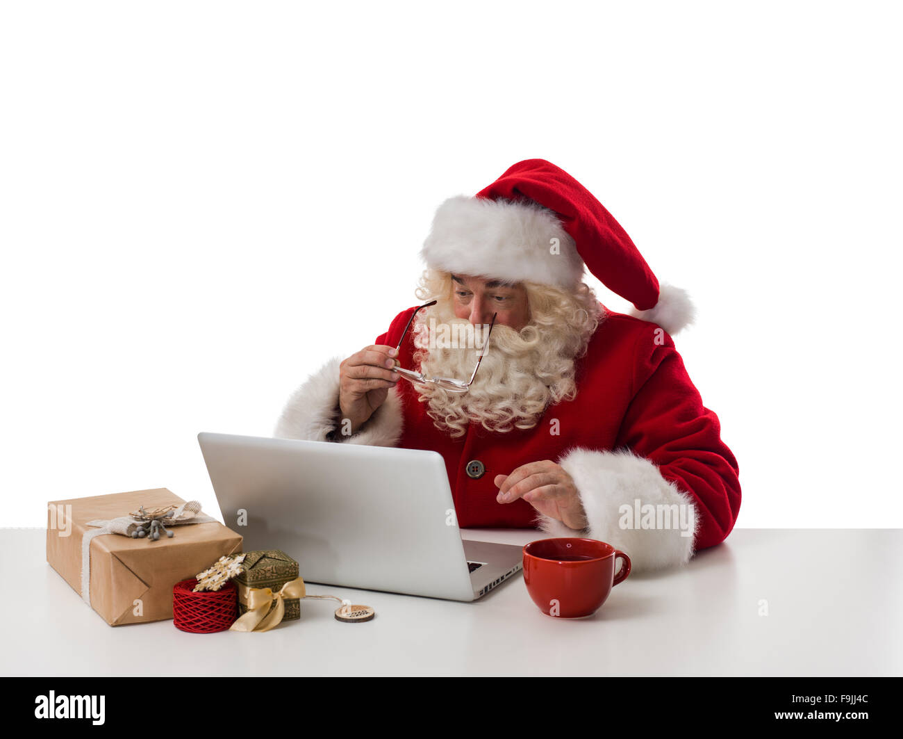 Santa Claus working with laptop Closeup Portrait Isolated on White ...
