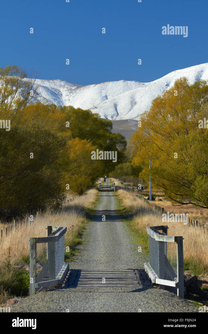 Otago Central Rail Trail in Ida Valley, and snow on Ida Range, Central ...