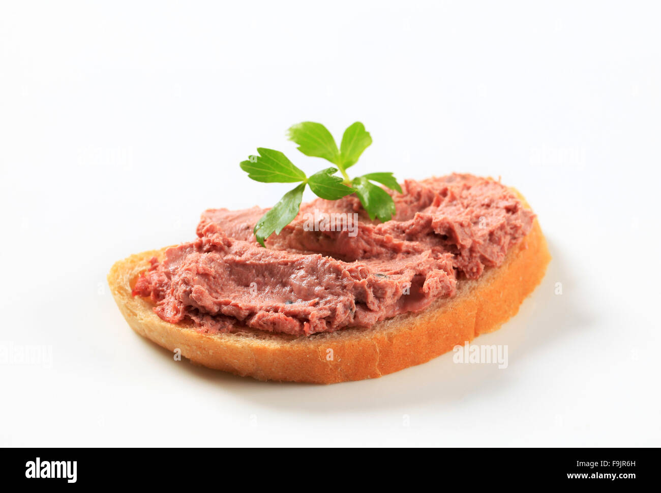 Slice of bread and liver pate Stock Photo - Alamy