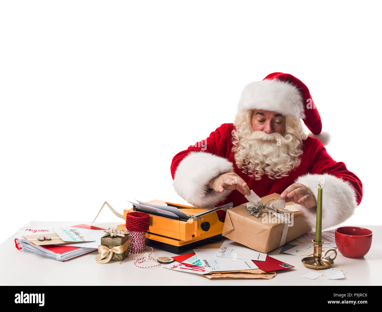 Santa Claus wrapping gift Closeup Portrait Isolated on White Background ...