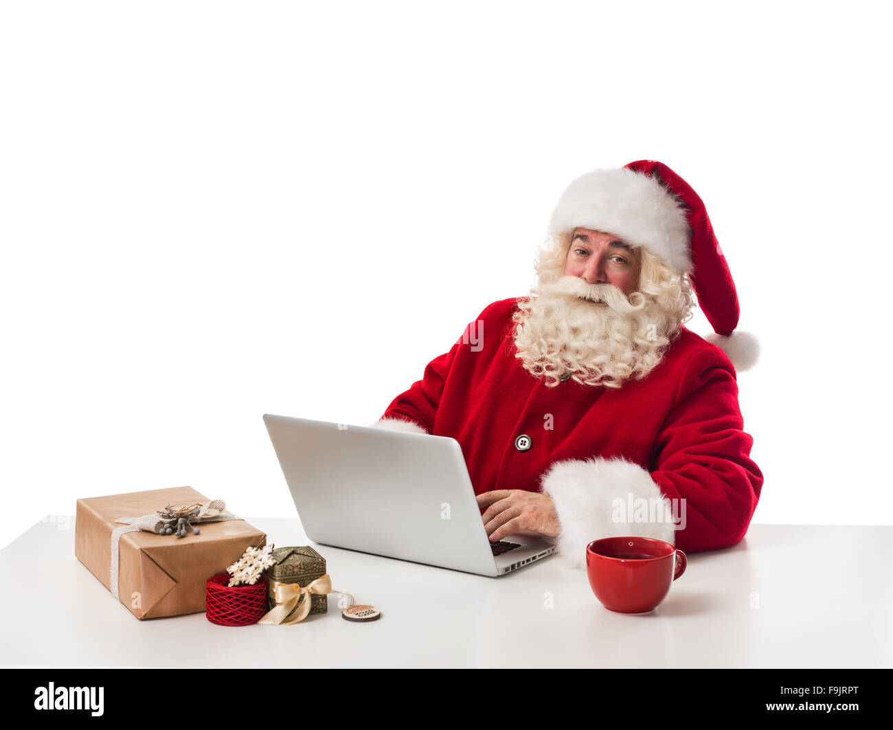 Santa Claus working with laptop Closeup Portrait Isolated on White ...
