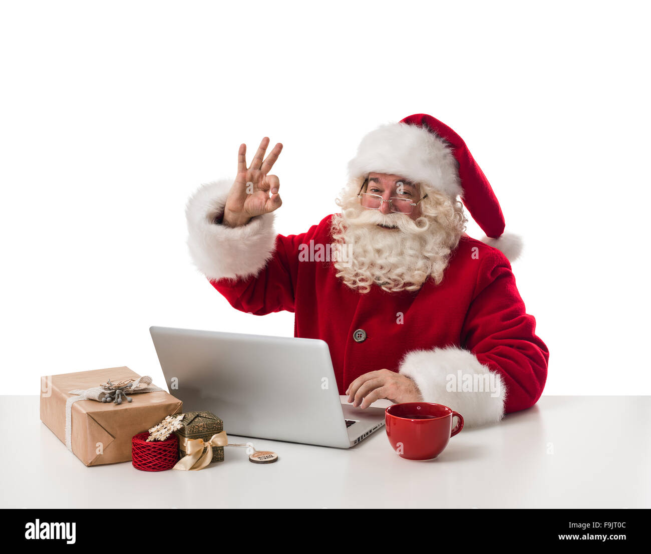 Santa Claus working with laptop Closeup Portrait Isolated on White ...