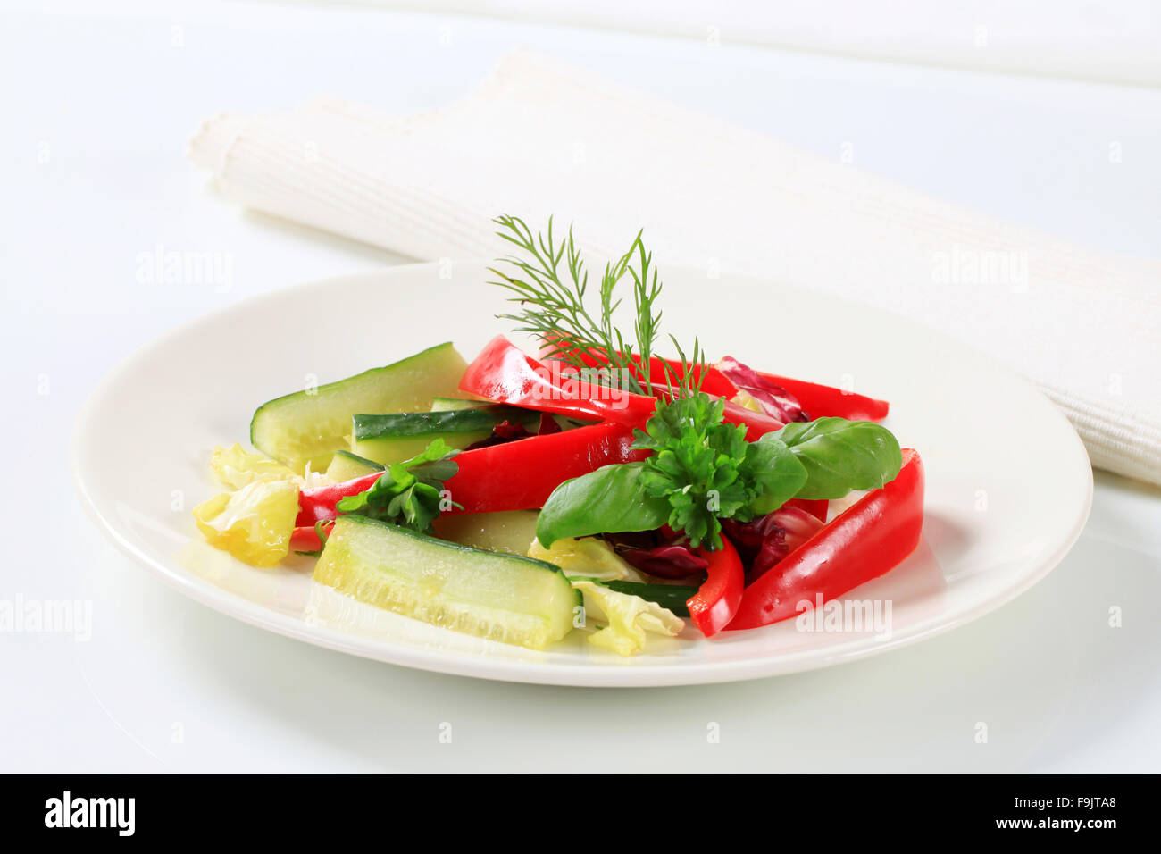 Red bell pepper and cucumber sticks Stock Photo - Alamy