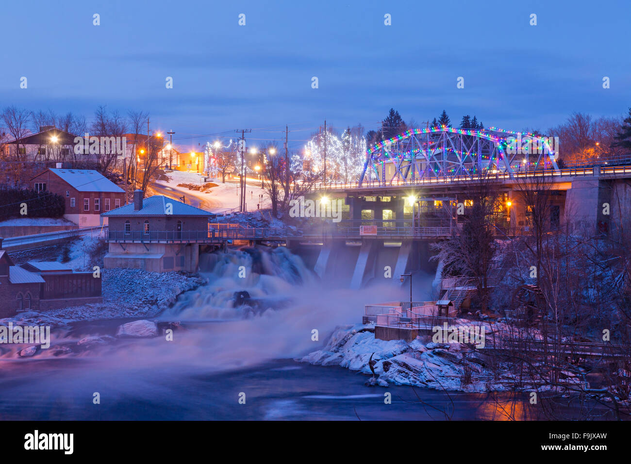 Lower Bracebridge Falls and hydro dam with a fresh snowfall on the Muskoka River. Bracebridge ...