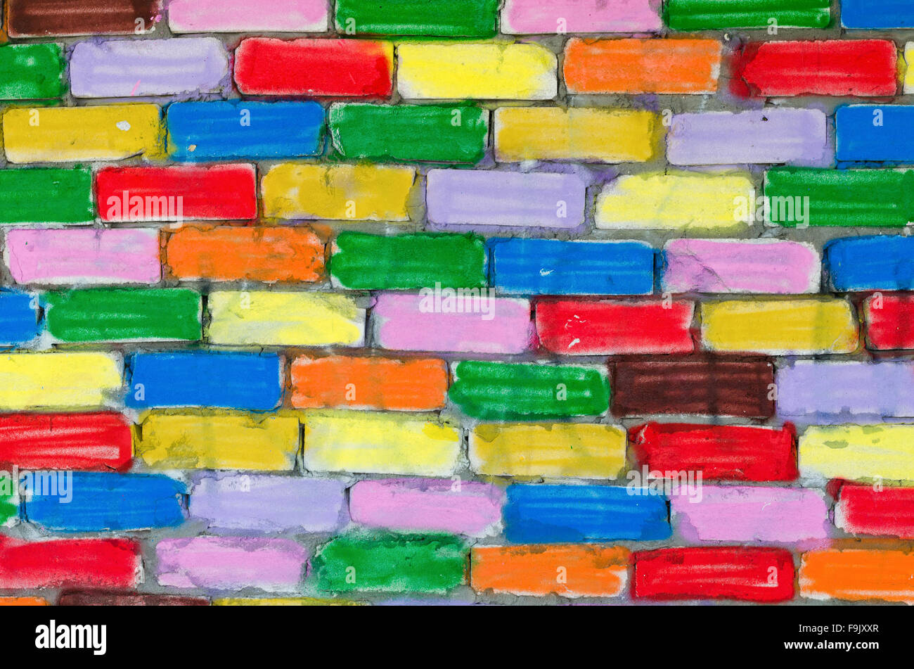 multicoloured wall as fun background Stock Photo - Alamy