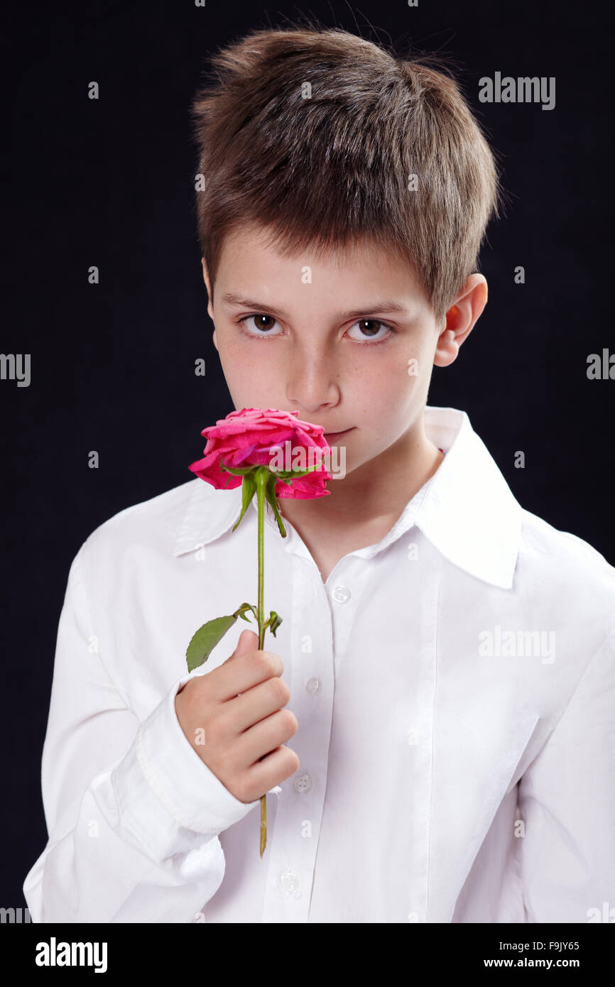 Boy with a rose hi-res stock photography and images - Alamy