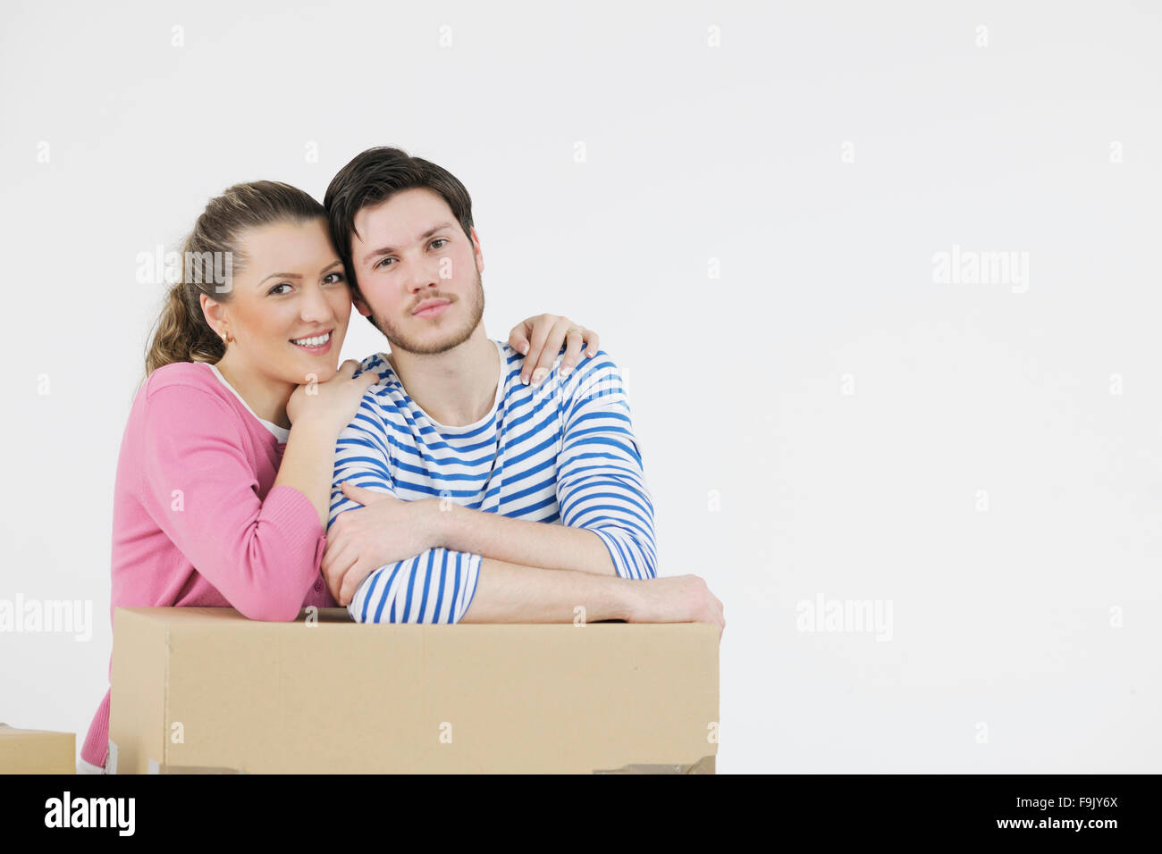 happy Young couple moving in new home Stock Photo - Alamy