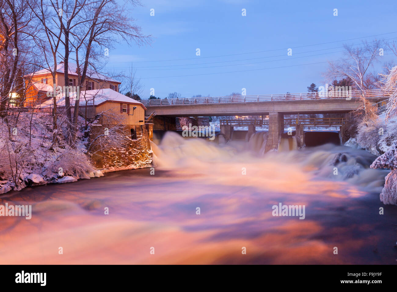 Upper Bracebridge Falls during a cold snowy night. Bracebridge, Muskoka ...